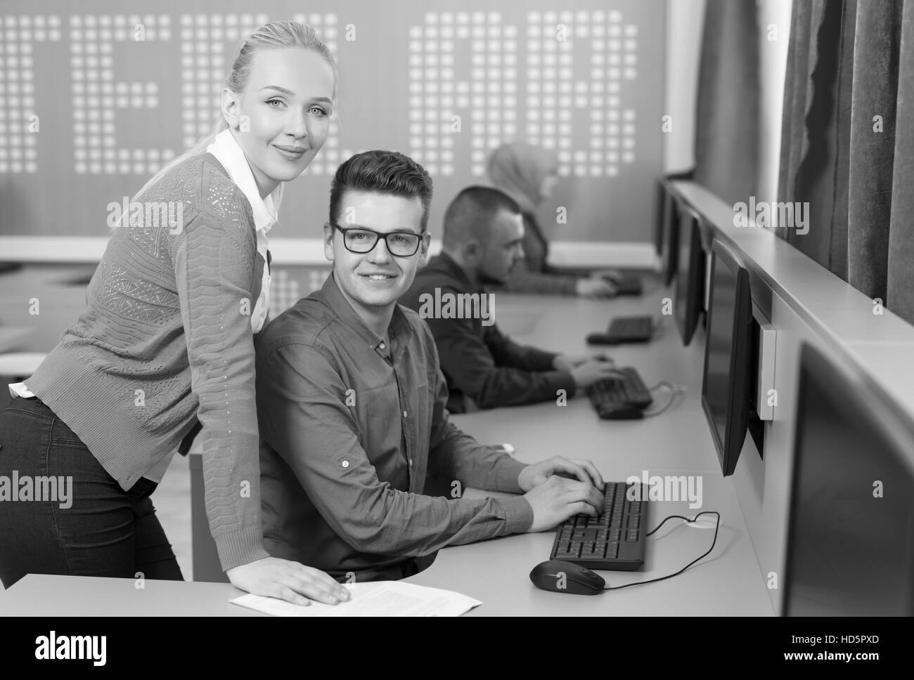 Students learning in computer lab Stock Photo - Alamy