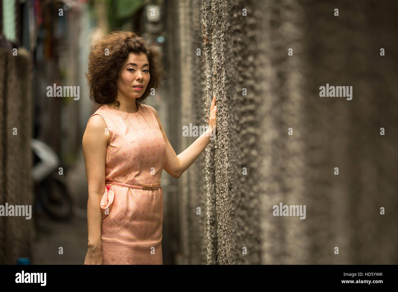 Urban portrait of young Asian woman Stock Photo - Alamy