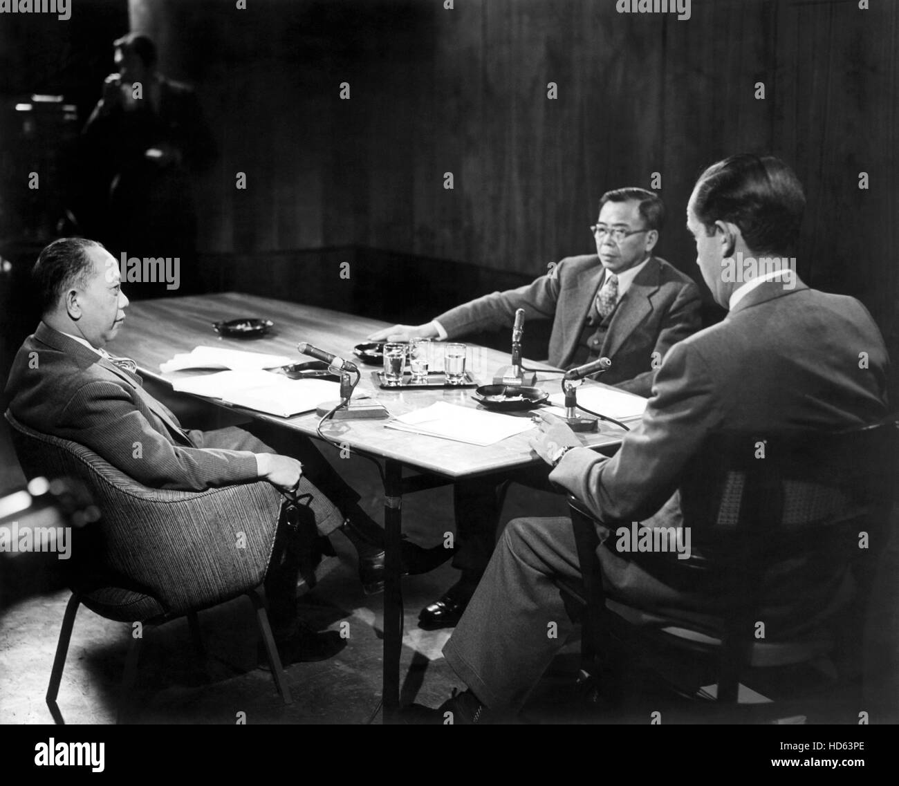 SEE IT NOW, Carlos Romulo (seated left), host Edward R. Murrow (back to ...