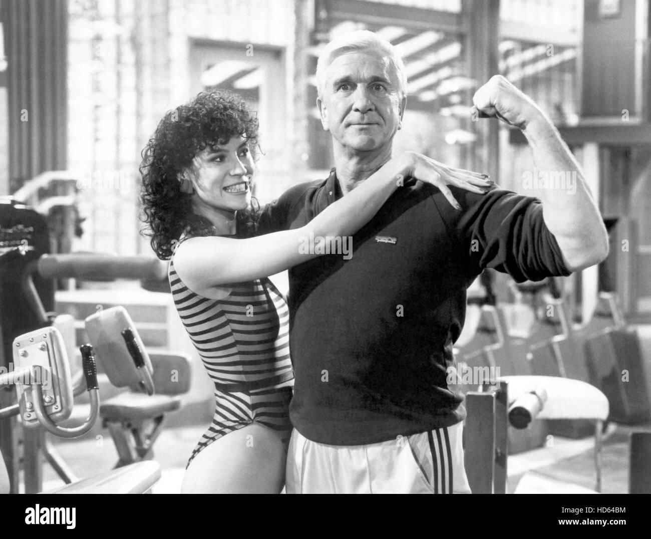 SHAPING UP, Jennifer Tilly, Leslie Nielsen, 1984 Stock Photo - Alamy