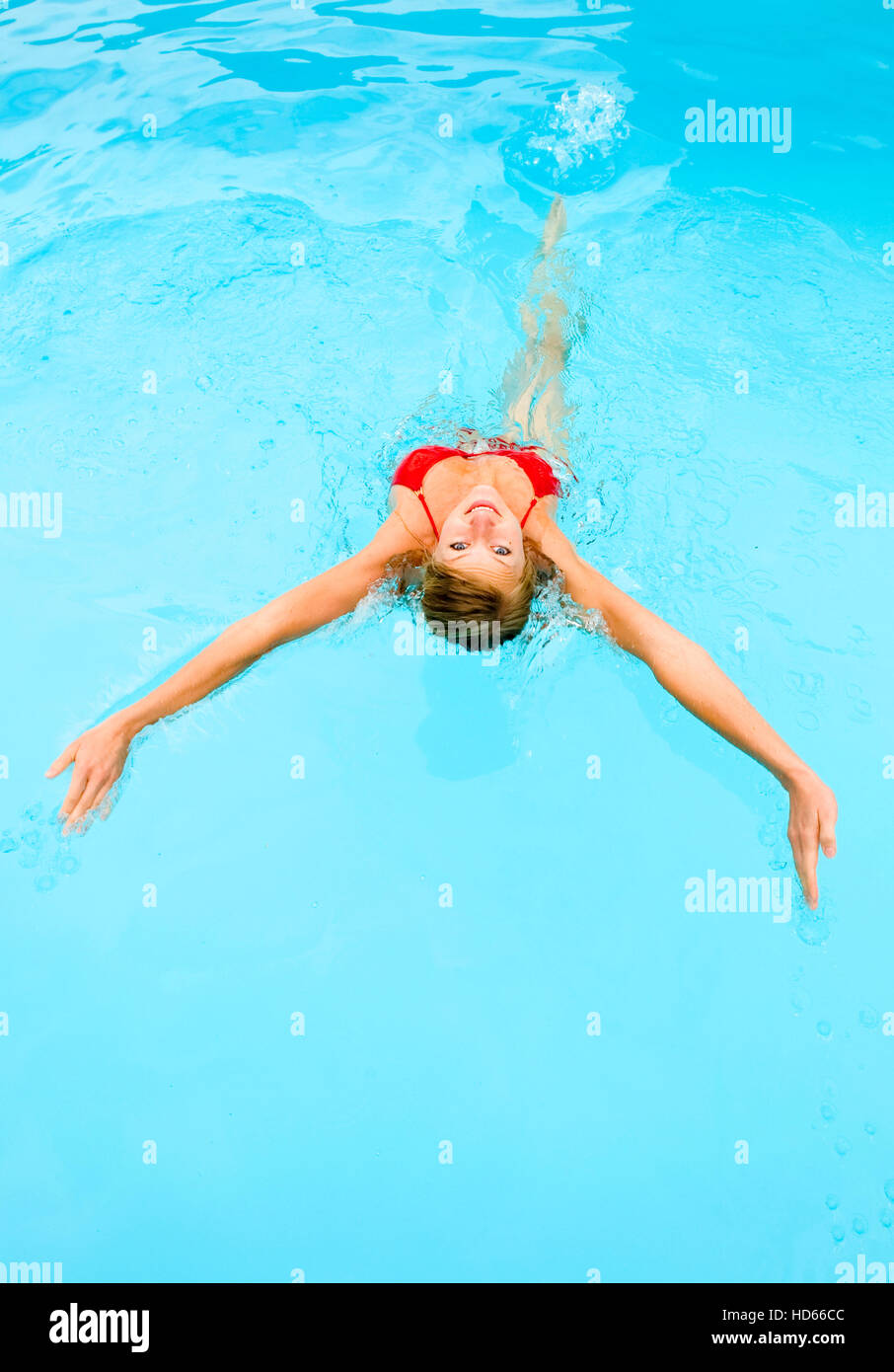 Sunbathing in bikinis hi-res stock photography and images - Alamy