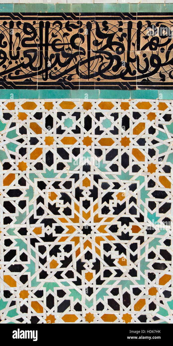 Islamic calligraphy and tiled mosaic, zellij, at Bou Inania, Bouanania ...