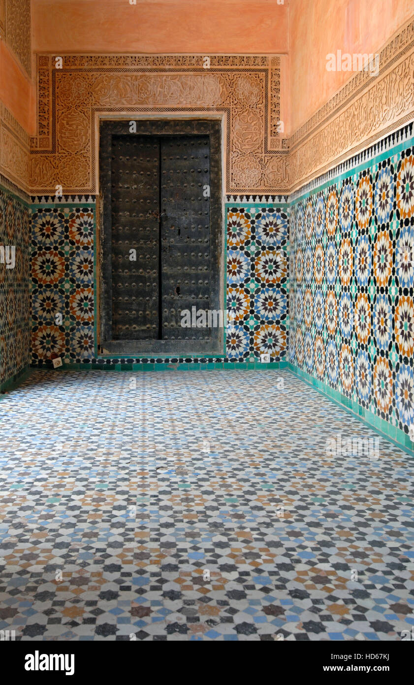Tiled corridor with a metallic door at the Ali ben Youssef, Bin Yousuf ...