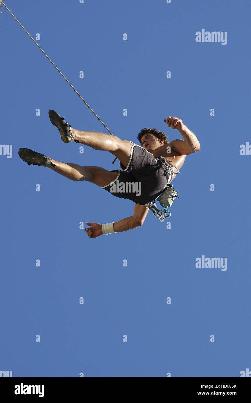 Man abseil abseiling climbing rope hi-res stock photography and images ...