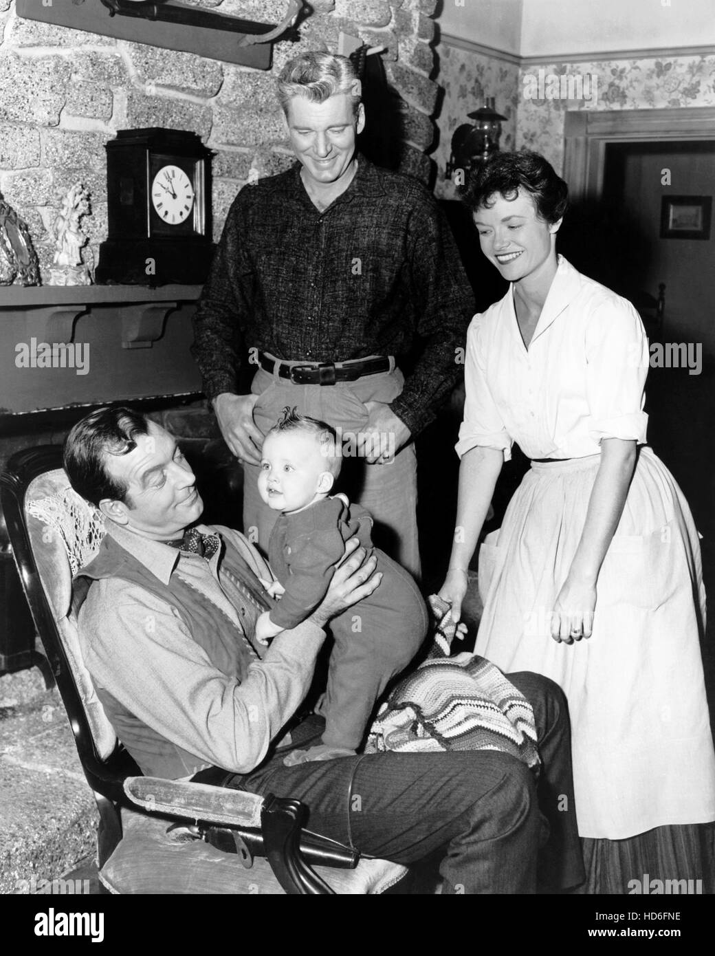 THE RESTLESS GUN, from left, John Payne, (holding Bryan Mackey ...