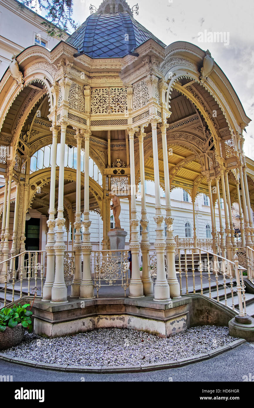 Carved Park Colonnade of Karlovy Vary, Czech republic. People on the ...
