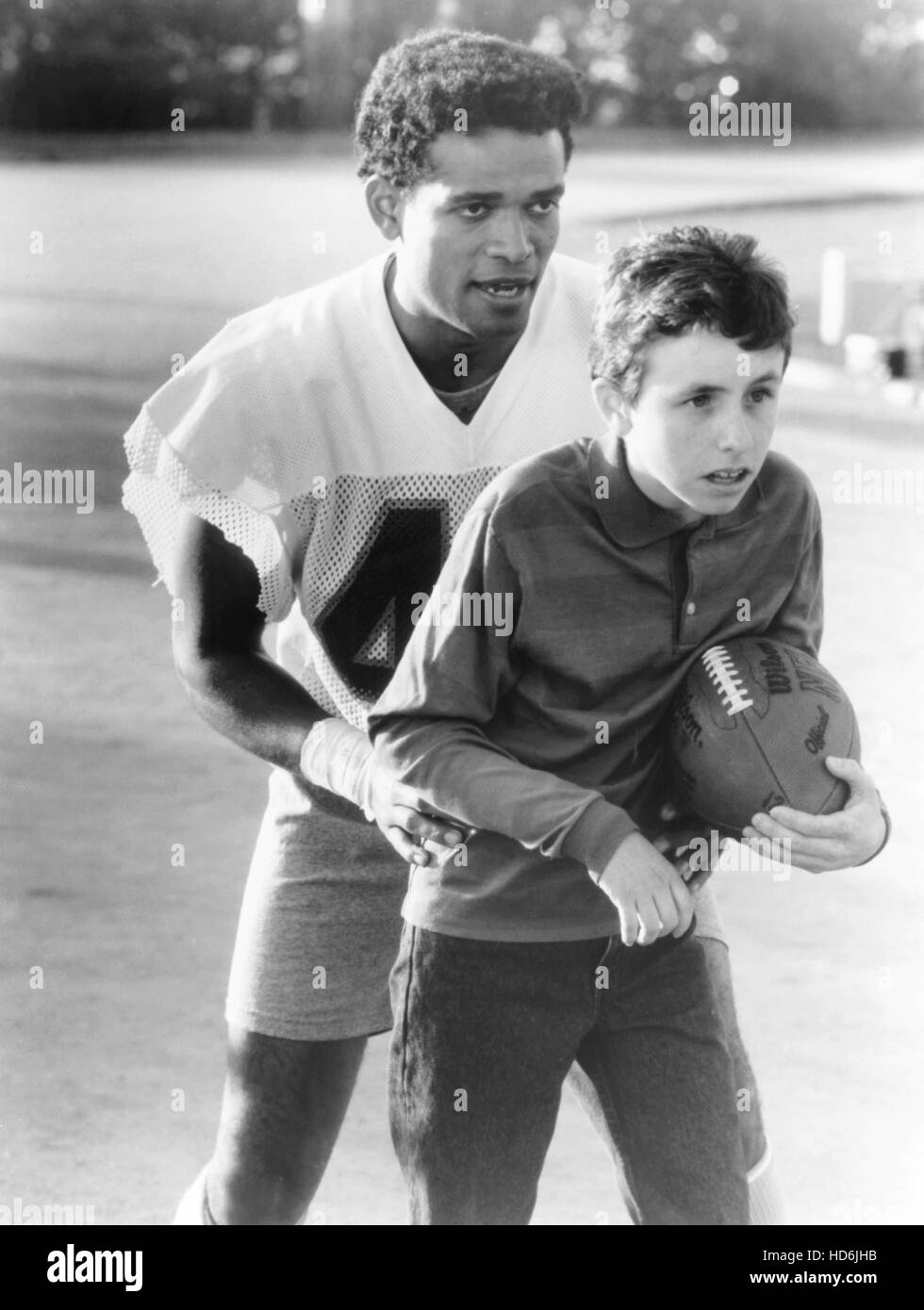 A TRIUMPH OF THE HEART: THE RICKY BELL STORY, from left: Mario Van ...