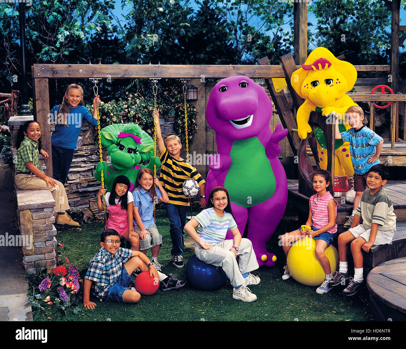 BARNEY AND FRIENDS, Barney the dinosaur, Selena Gomez (on yellow ball ...