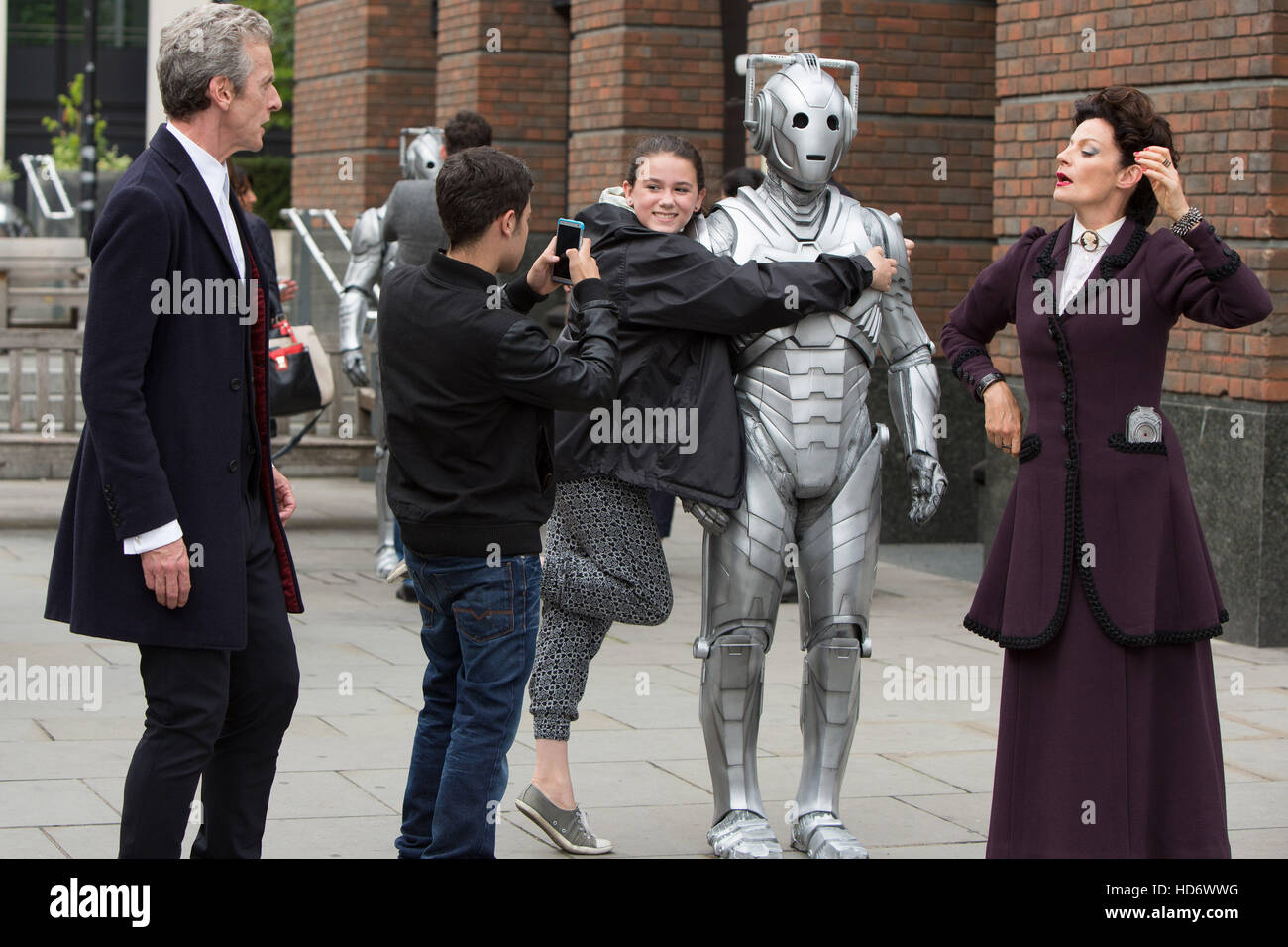 DOCTOR WHO, Peter Capaldi (left), Cyberman (2nd from right), Michelle ...