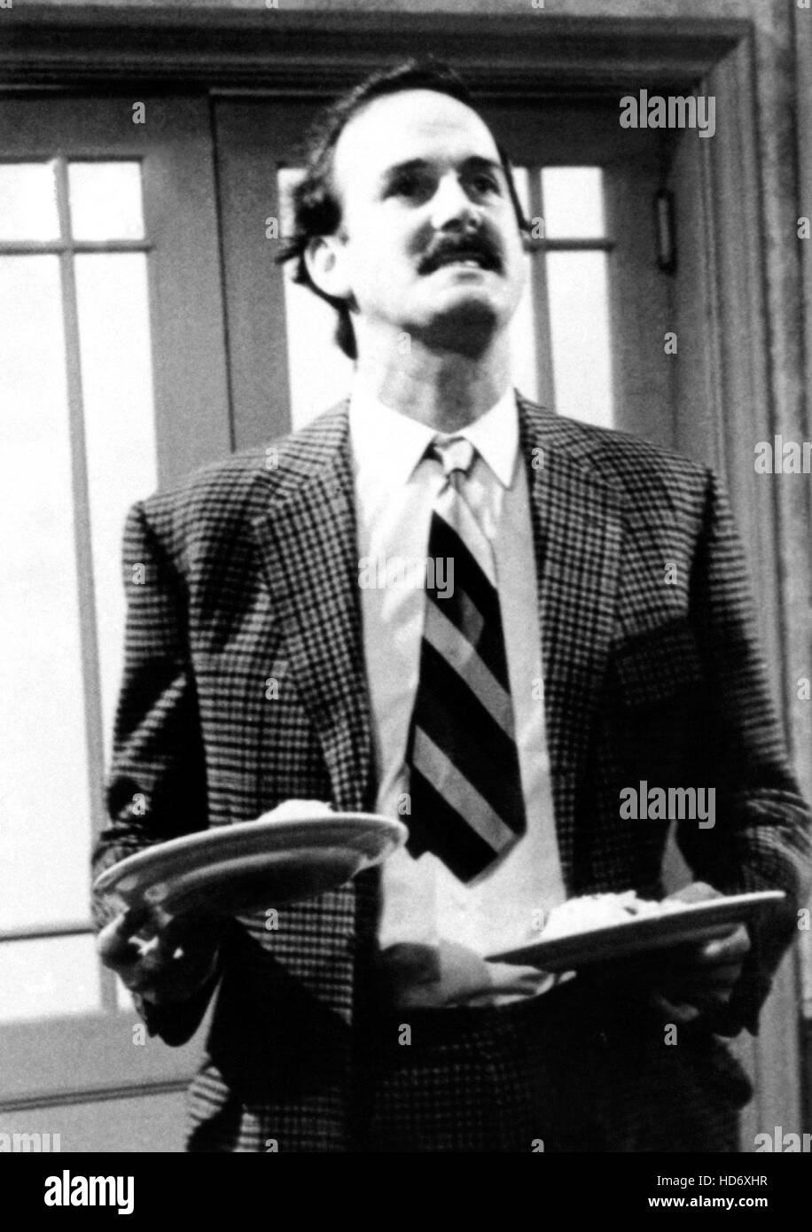 FAWLTY TOWERS, John Cleese, 1975-79 Stock Photo - Alamy