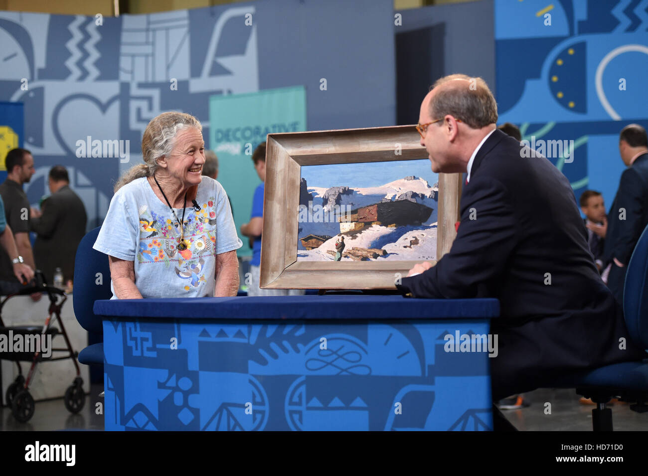 ANTIQUES ROADSHOW, Alan Fausel (right), appraises an Alfons Walde oil ...
