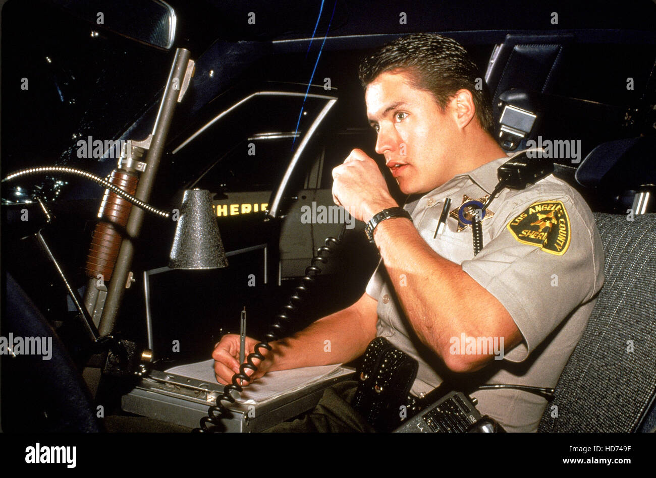 COPS, Los Angeles police officer on his radio, 1989-. © Fox / Courtesy ...