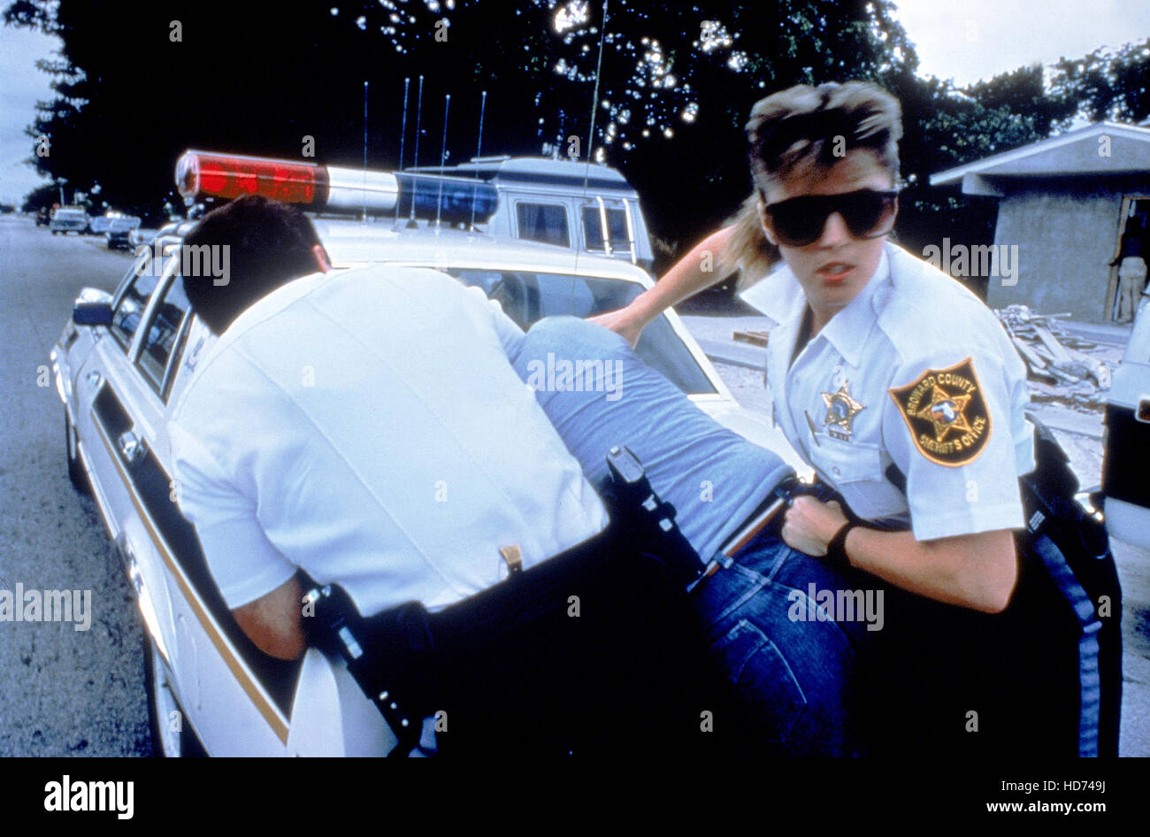 COPS, Broward County, FL police officers restraining a suspect, 1989 ...