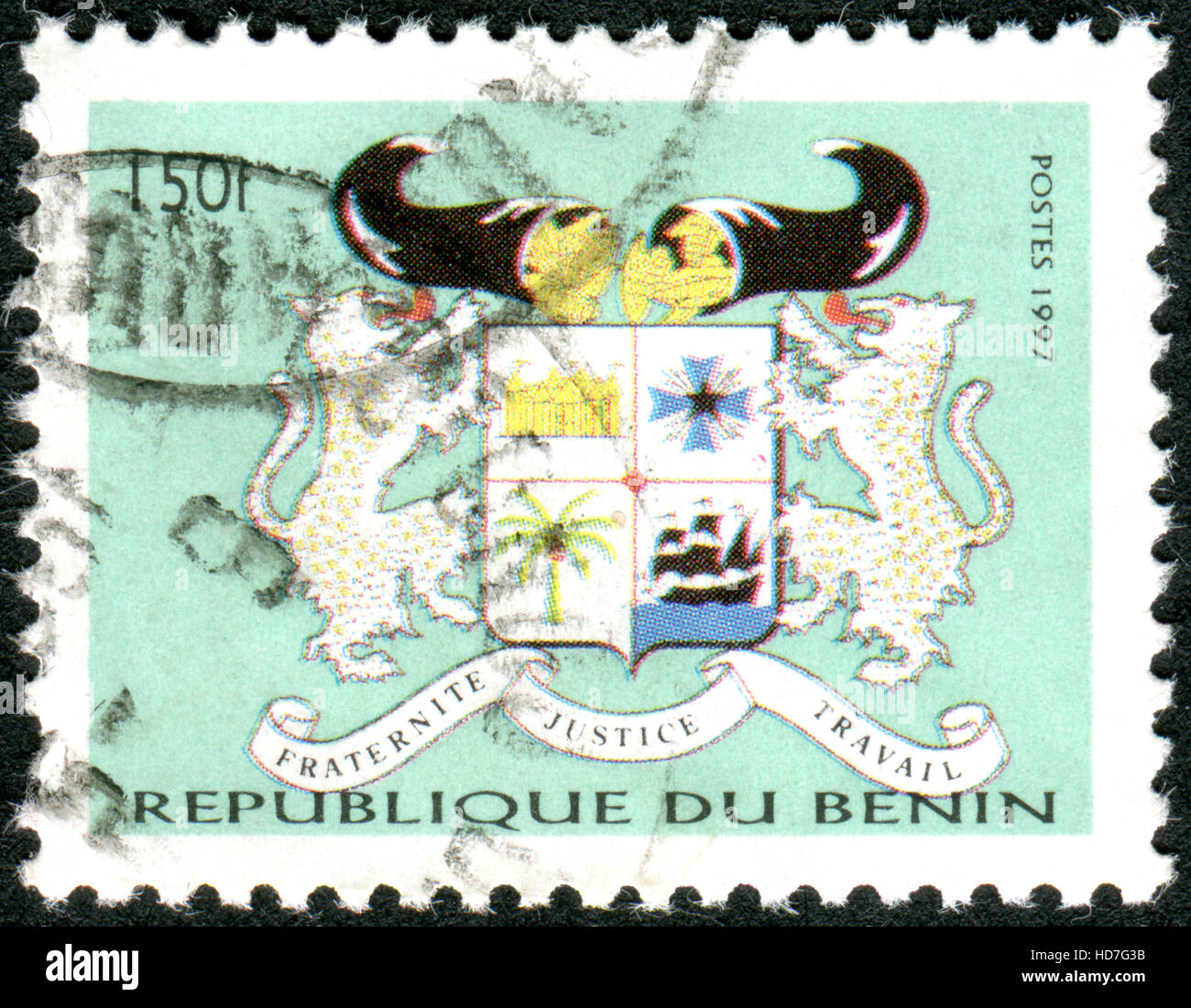 BENIN - CIRCA 1997: A stamp printed in Benin, shows the National Coat ...