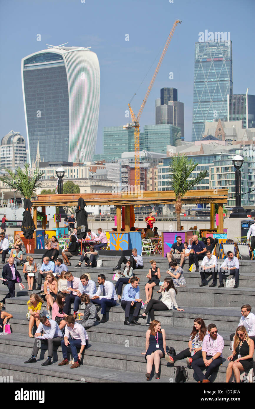 People enjoying the warm sunshine and hot weather on London Riverside ...