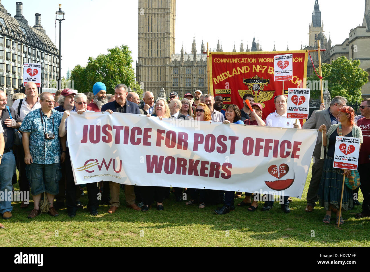 Striking post office workers attend a protest in Parliament Square over ...