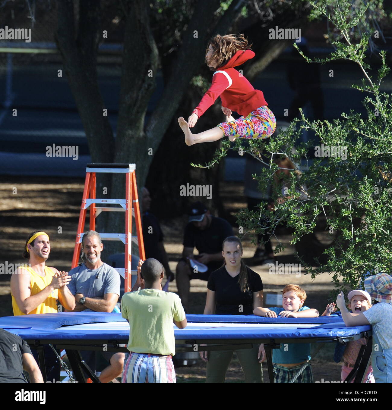 Adam Sandler gives his wife Jackie Sandler a high five after nailing ...