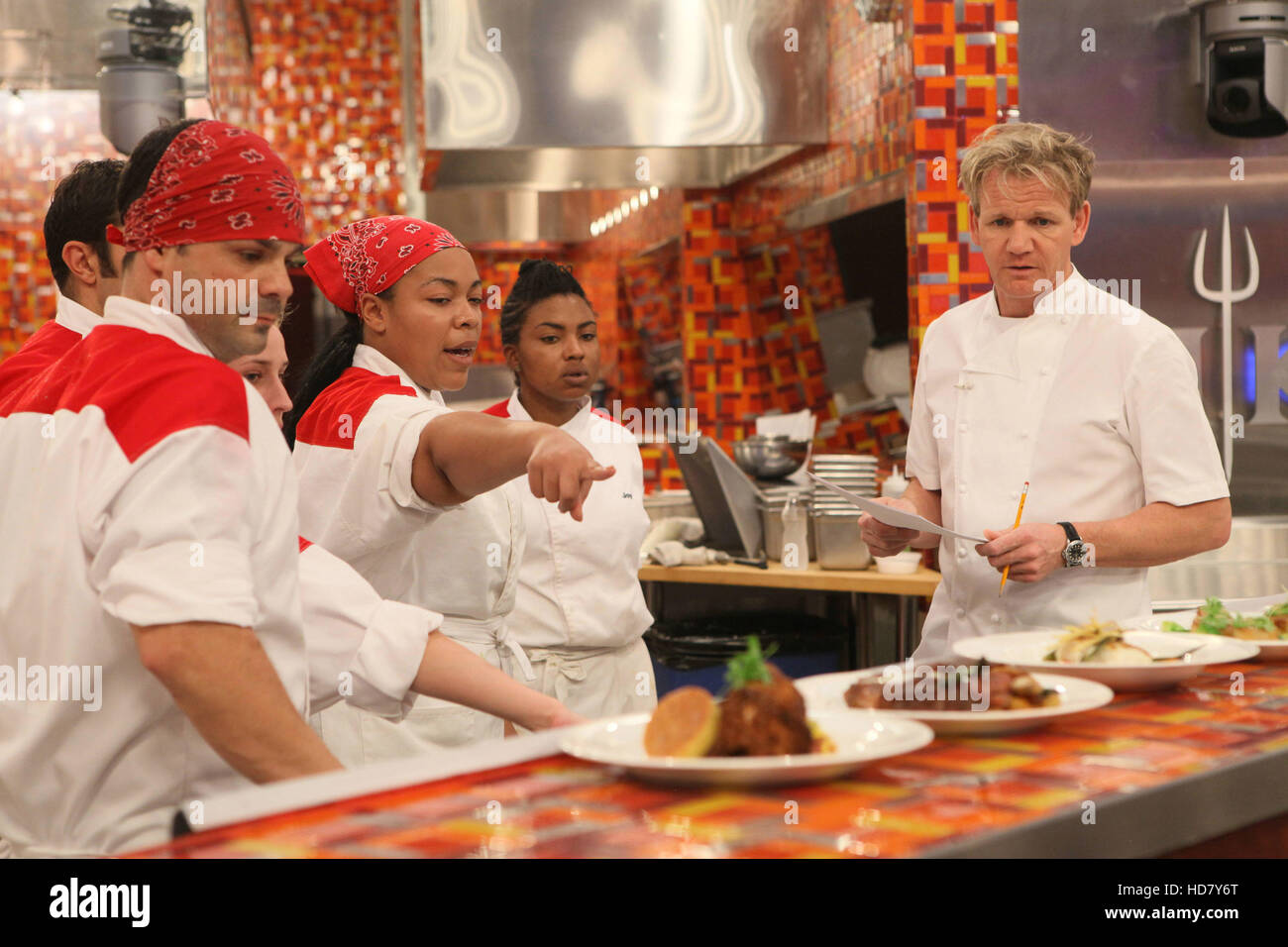 HELL'S KITCHEN, chef Gordon Ramsay (right), preps dinner with the Red ...