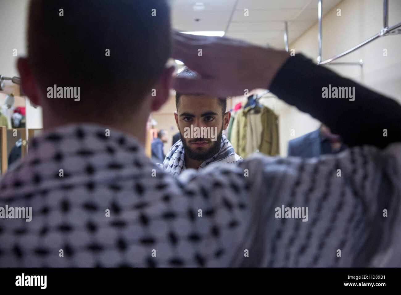 Palestinians listen to the national anthem during the Palestine Days in ...