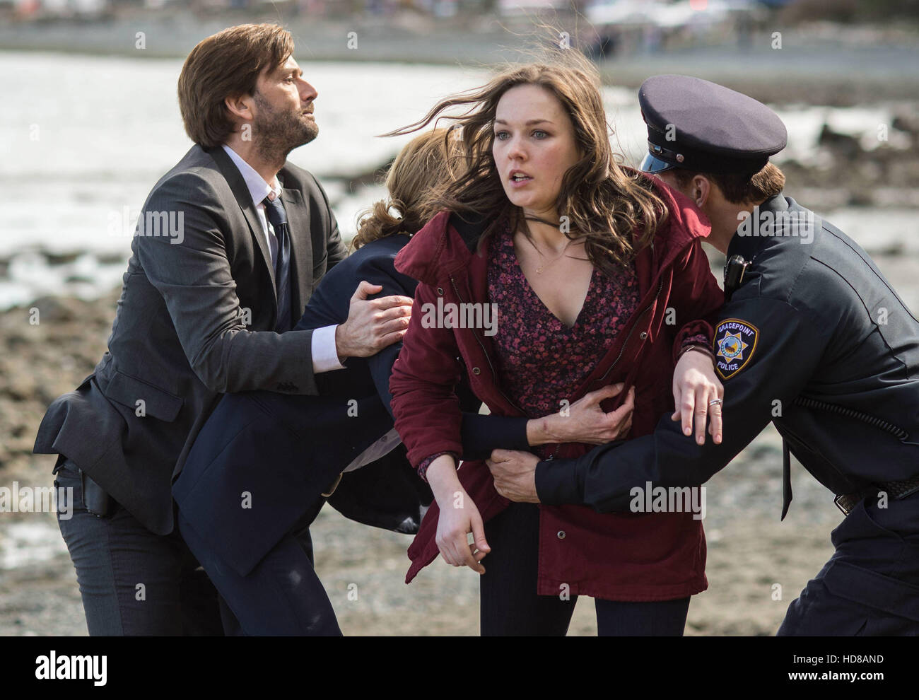 GRACEPOINT, David Tennant (left), Anna Gunn (2nd from left, obscured ...