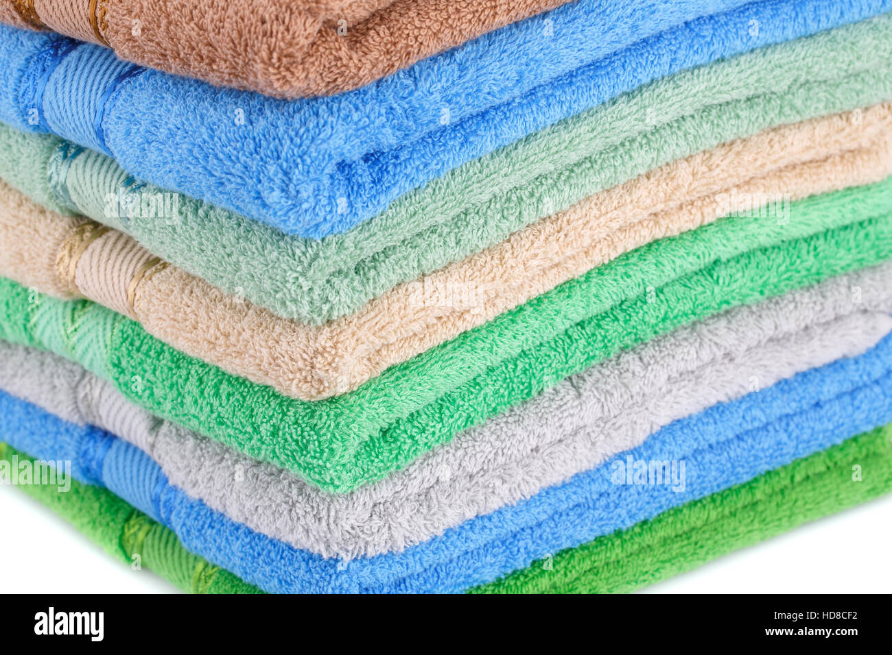 Colorful towels stack closeup picture Stock Photo - Alamy
