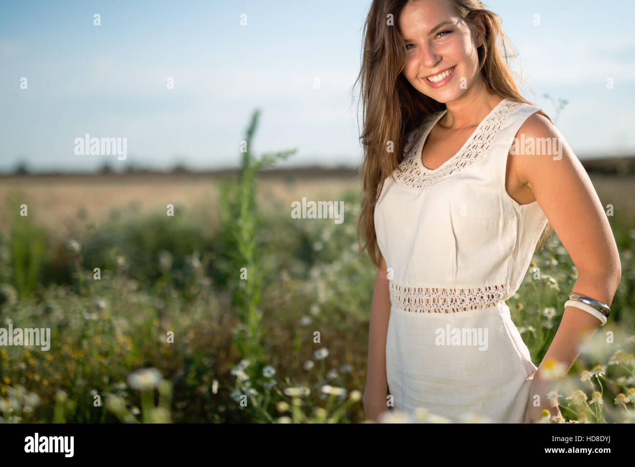 Beautiful happy woman outdoors in countryside Stock Photo - Alamy