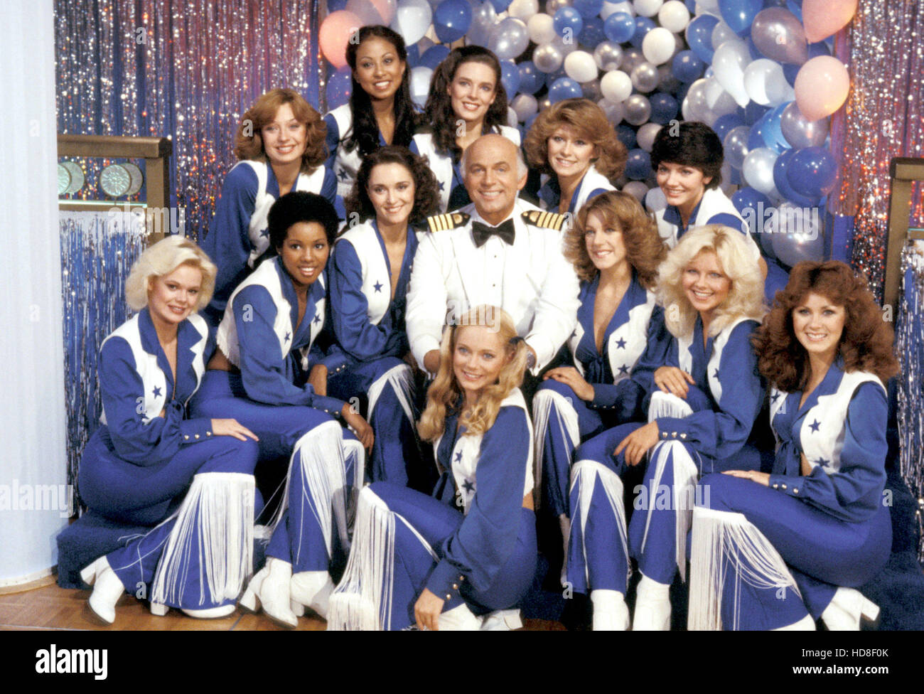 THE LOVE BOAT, Gavin MacLeod (center) surrounded by The Dallas Cowboys ...