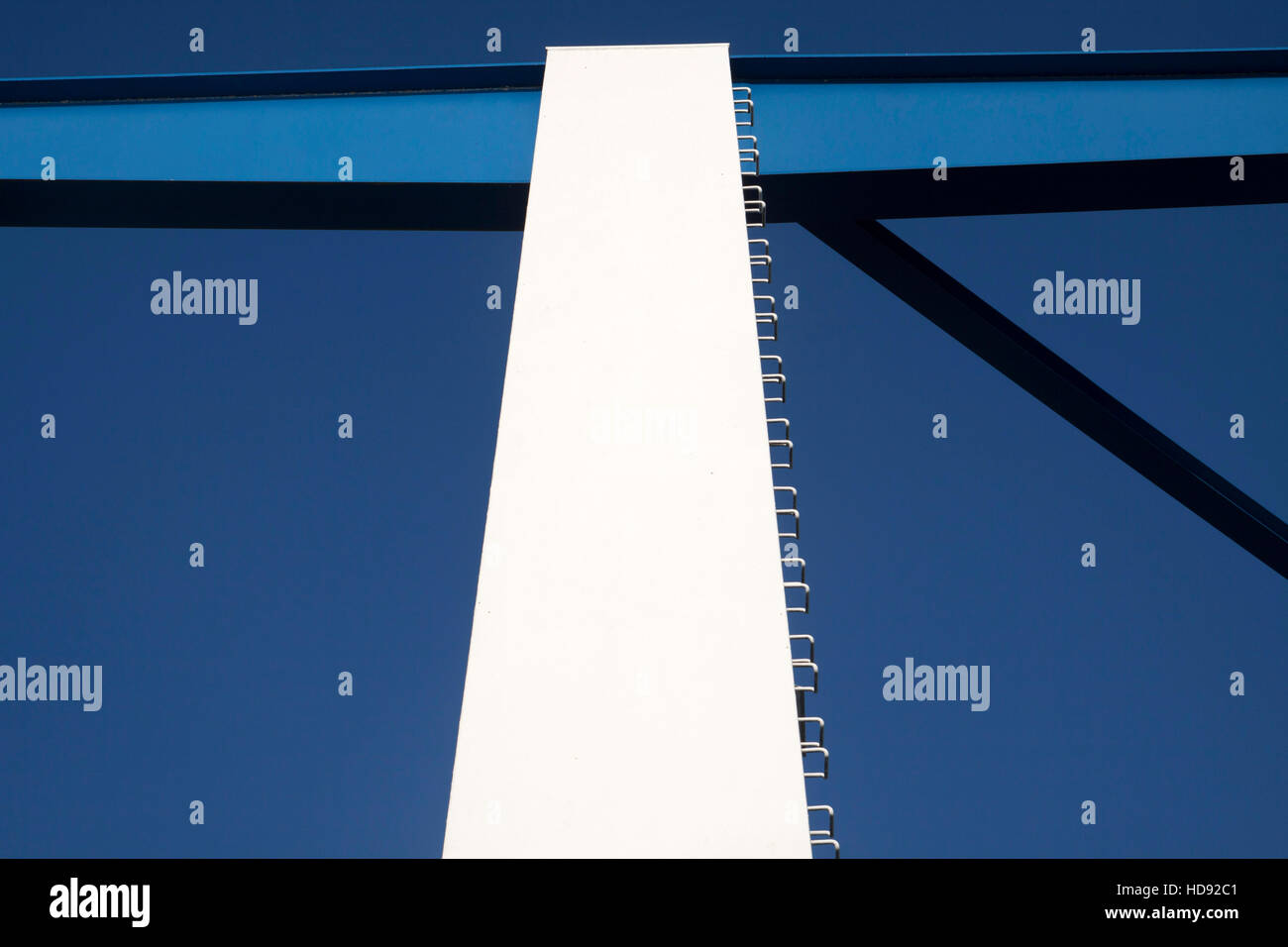 White, blue steel bridge sections of a bridge. abstract contrast color ...