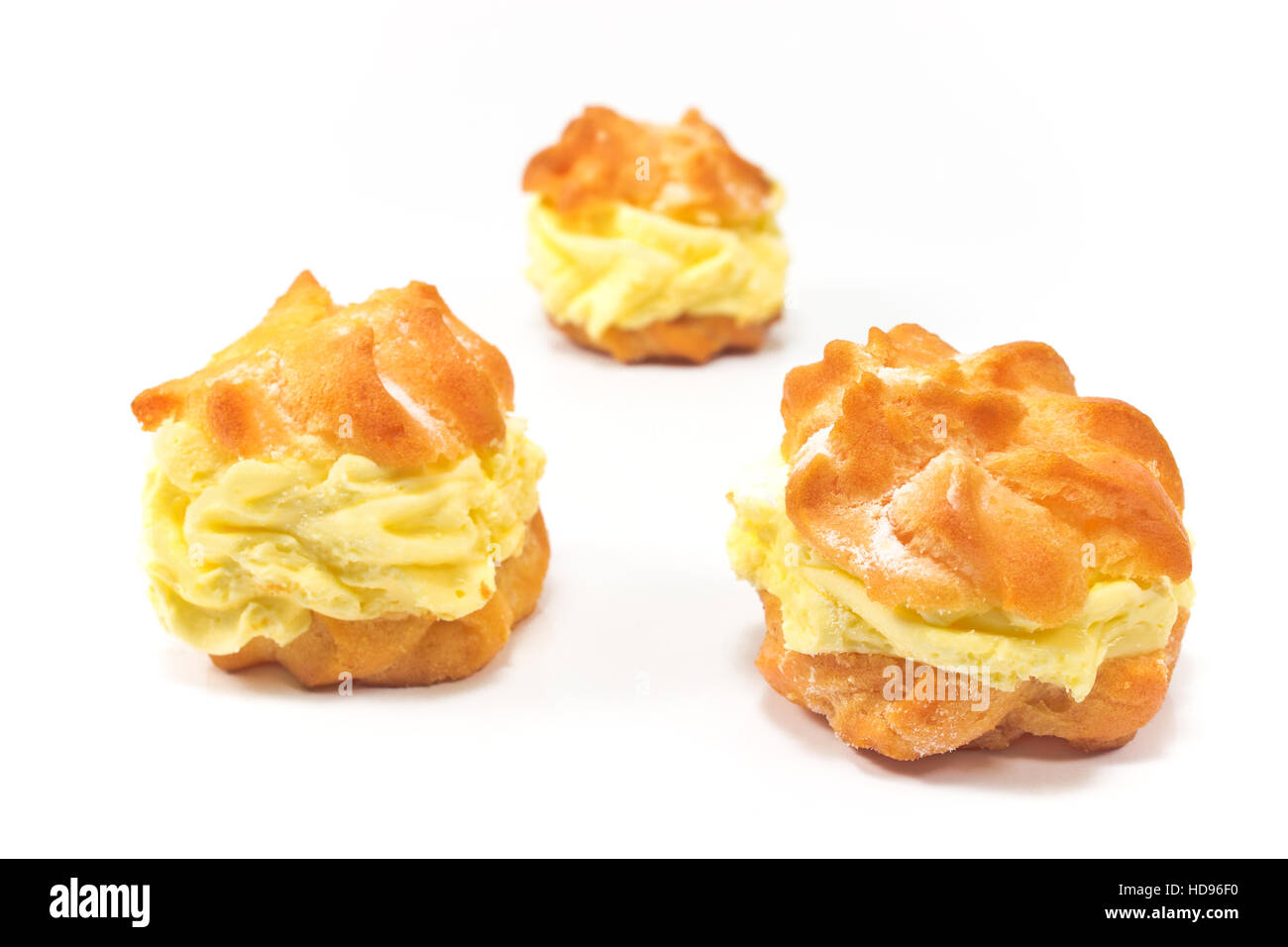 Cream Puffs isolated on white Stock Photo - Alamy