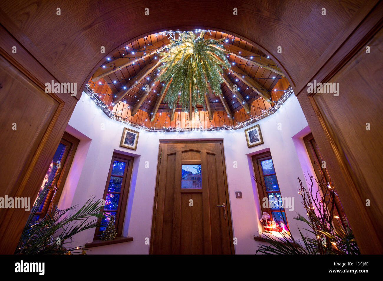 The front entrance porch decked out with trimmings and lights at Sheila ...
