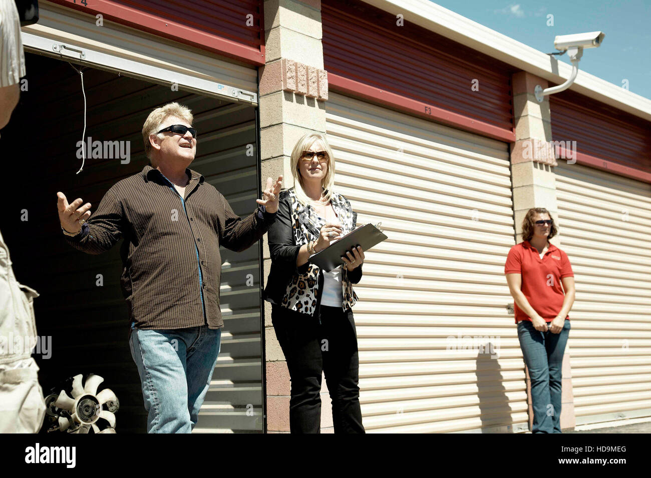 STORAGE WARS, (from left): auctioneers Dan Dotson, Laura Dotson ...