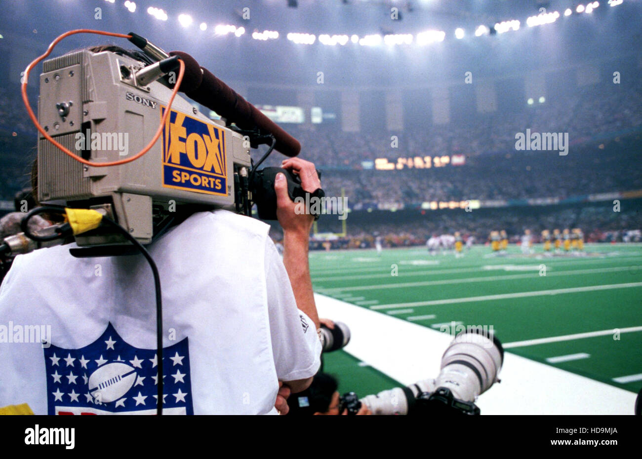 SUPER BOWL XXXI, a TV cameraman, during FOX's first-ever Super Bowl ...