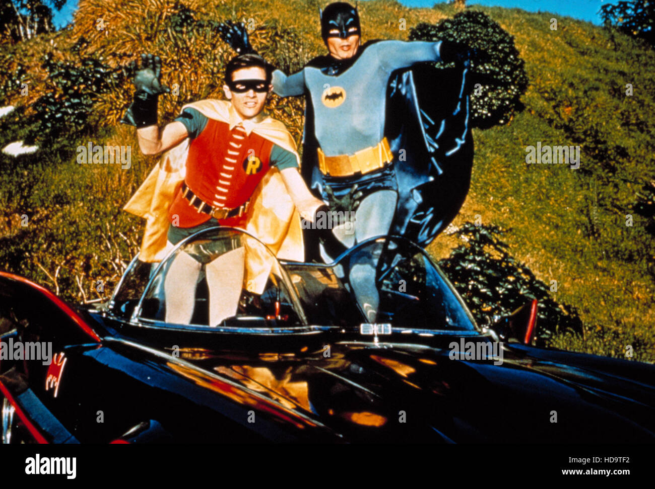 BATMAN, Burt Ward, Adam West, at the Batmobile, 1966-68. TM and Copyright (c) 20th Century Fox ...
