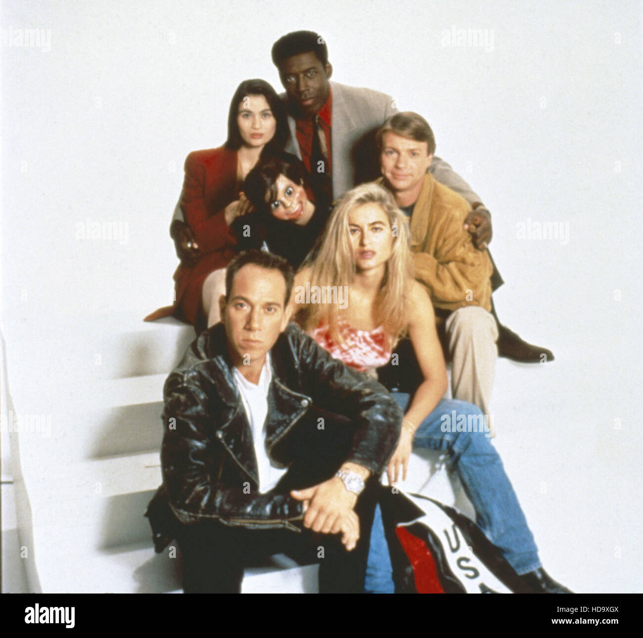 BROKEN BADGES, clockwise from bottom: Miguel Ferrer, Charlotte Lewis ...
