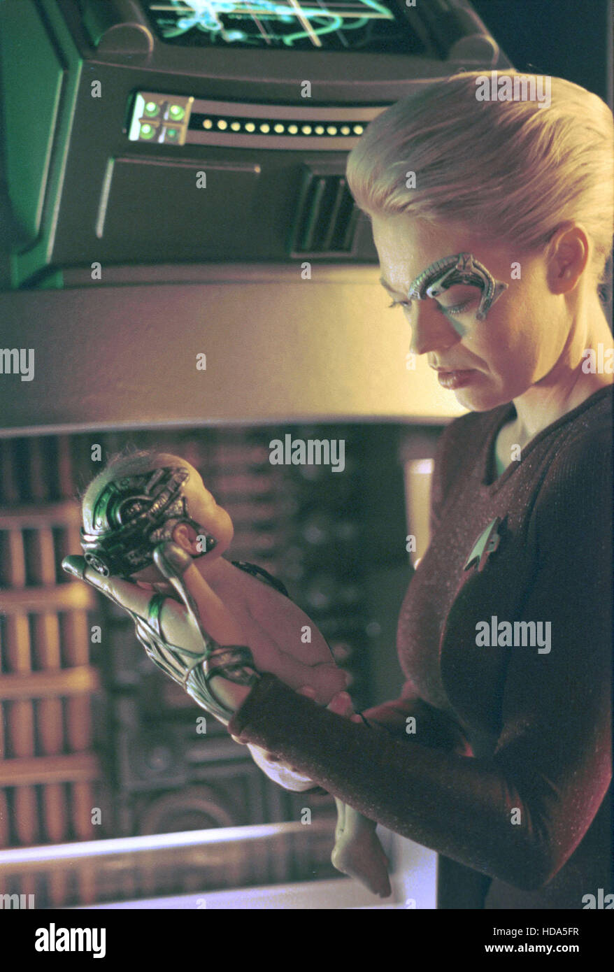 STAR TREK: VOYAGER. 1995-2001. Jeri Ryan, cradling a Borg baby ...