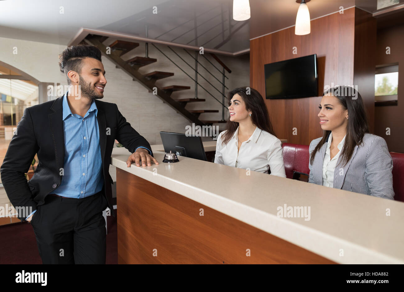 Young Business Man On Hotel Reception Office, Businessman Check In ...