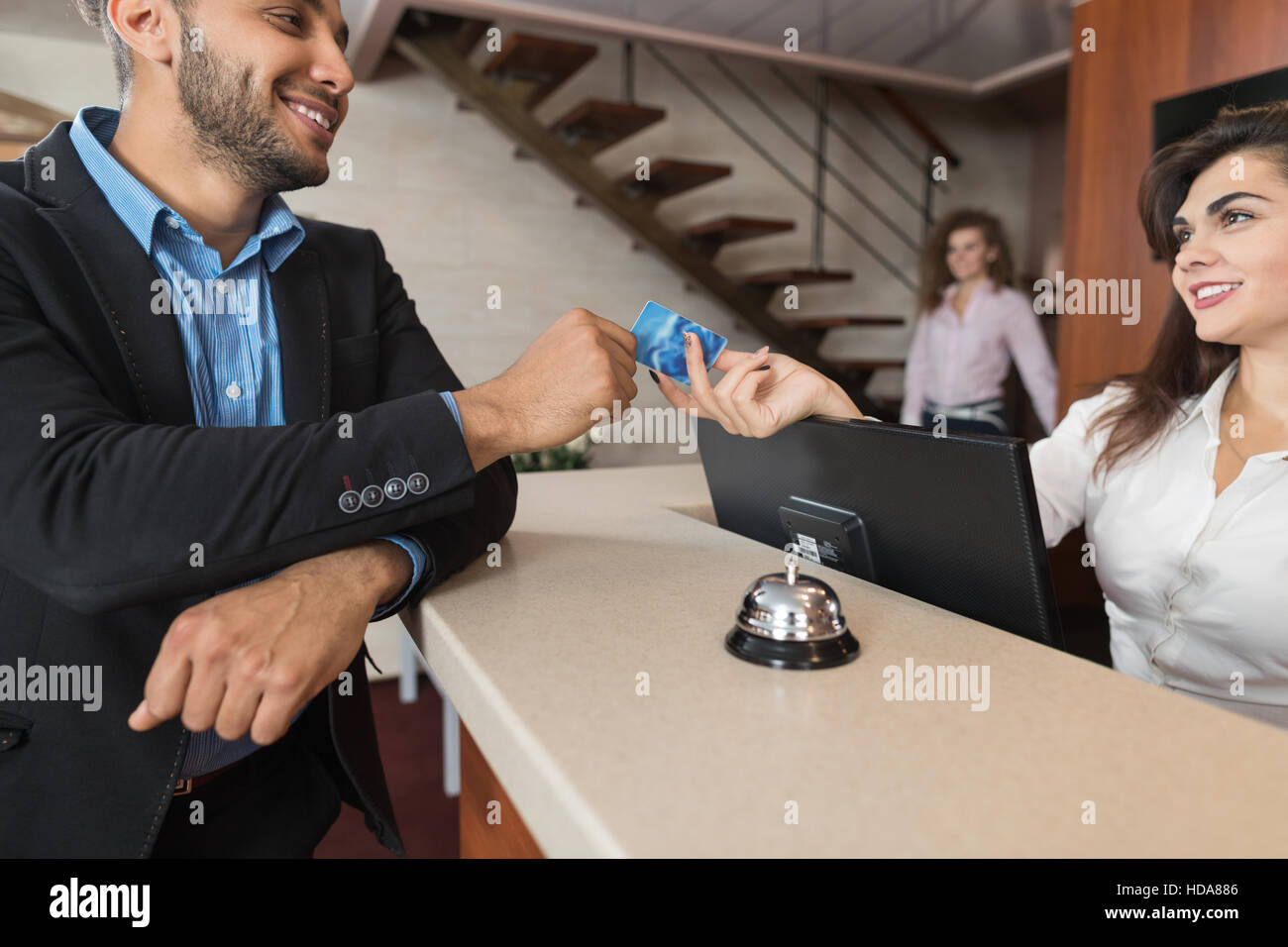 Business Man Arriving To Hotel Give Meeting Woman Receptionist Credit ...