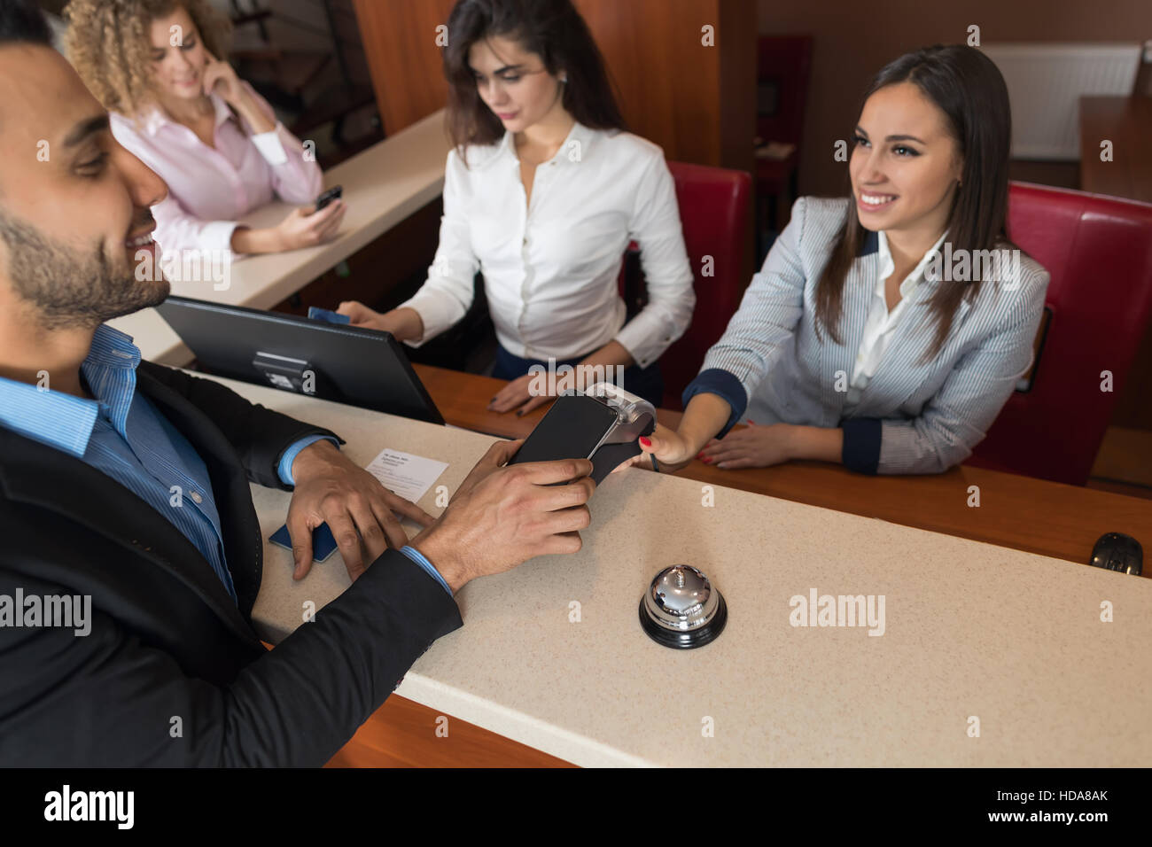 Business Man Arrive To Hotel Check In With Cell Phone Woman ...
