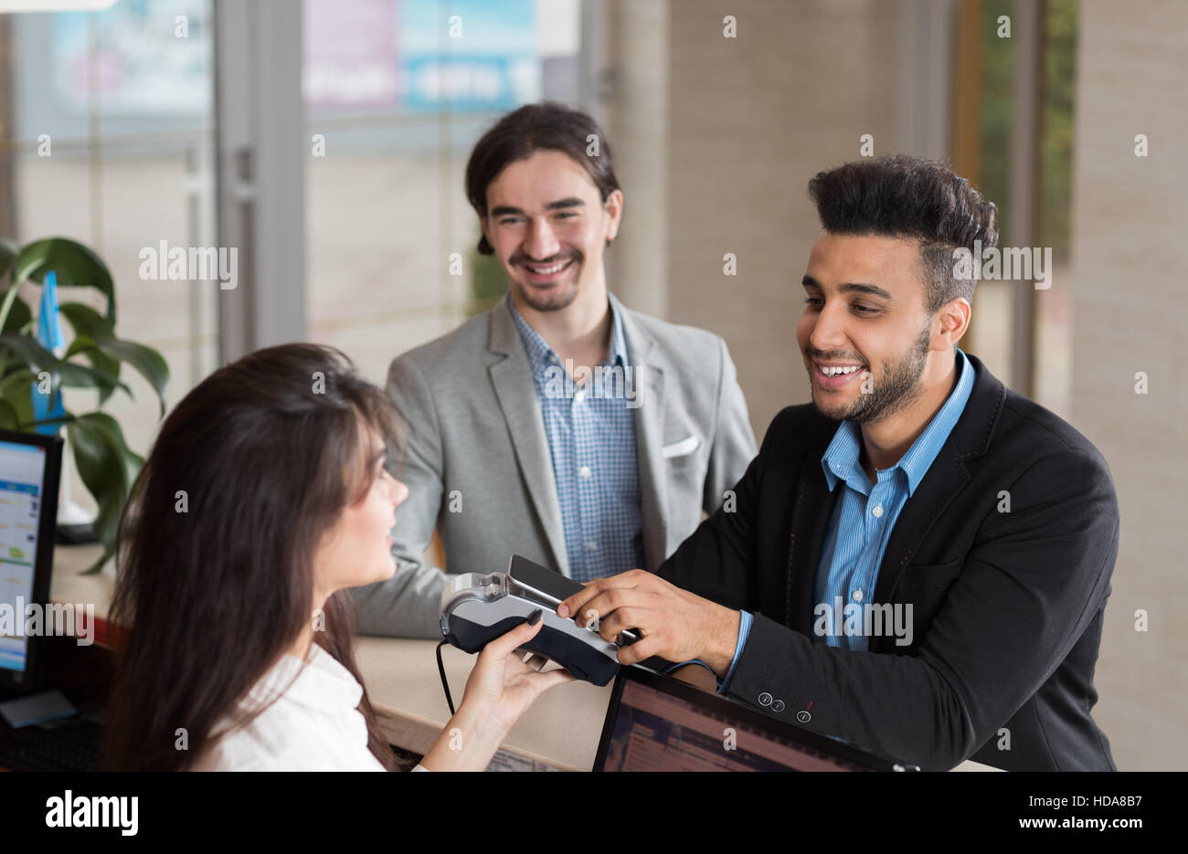 Young Business Man On Hotel Reception Office, Businessman Check In ...