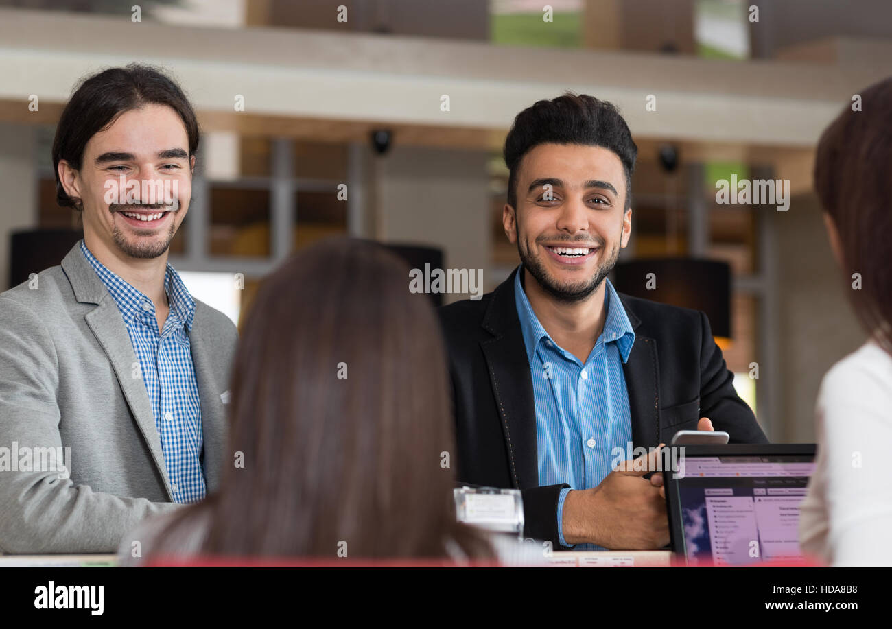 Business man arrive hotel check hi-res stock photography and images - Alamy