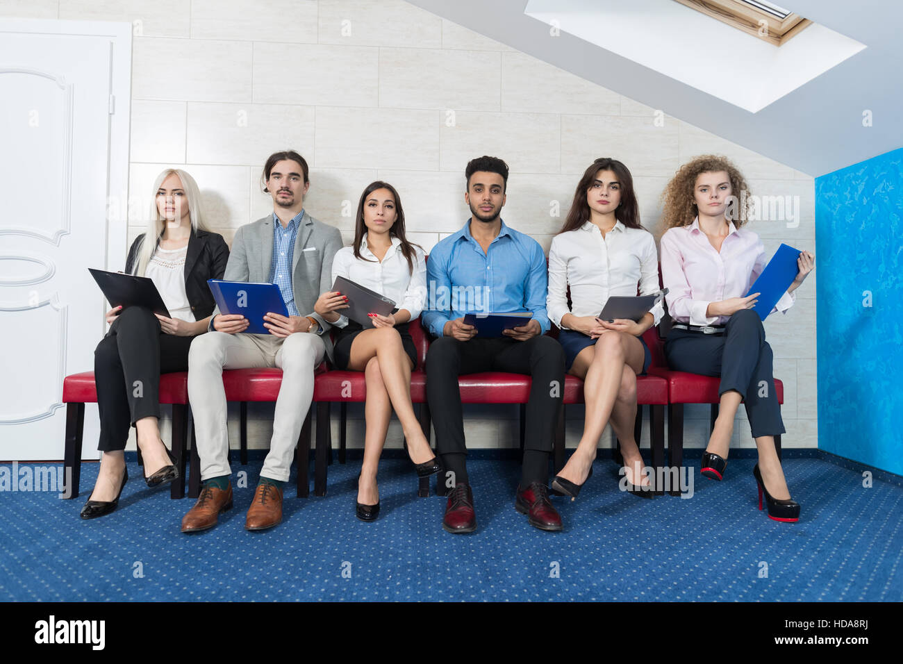 Tired Candidates Wait For Job Interview, Mix Race Business People ...