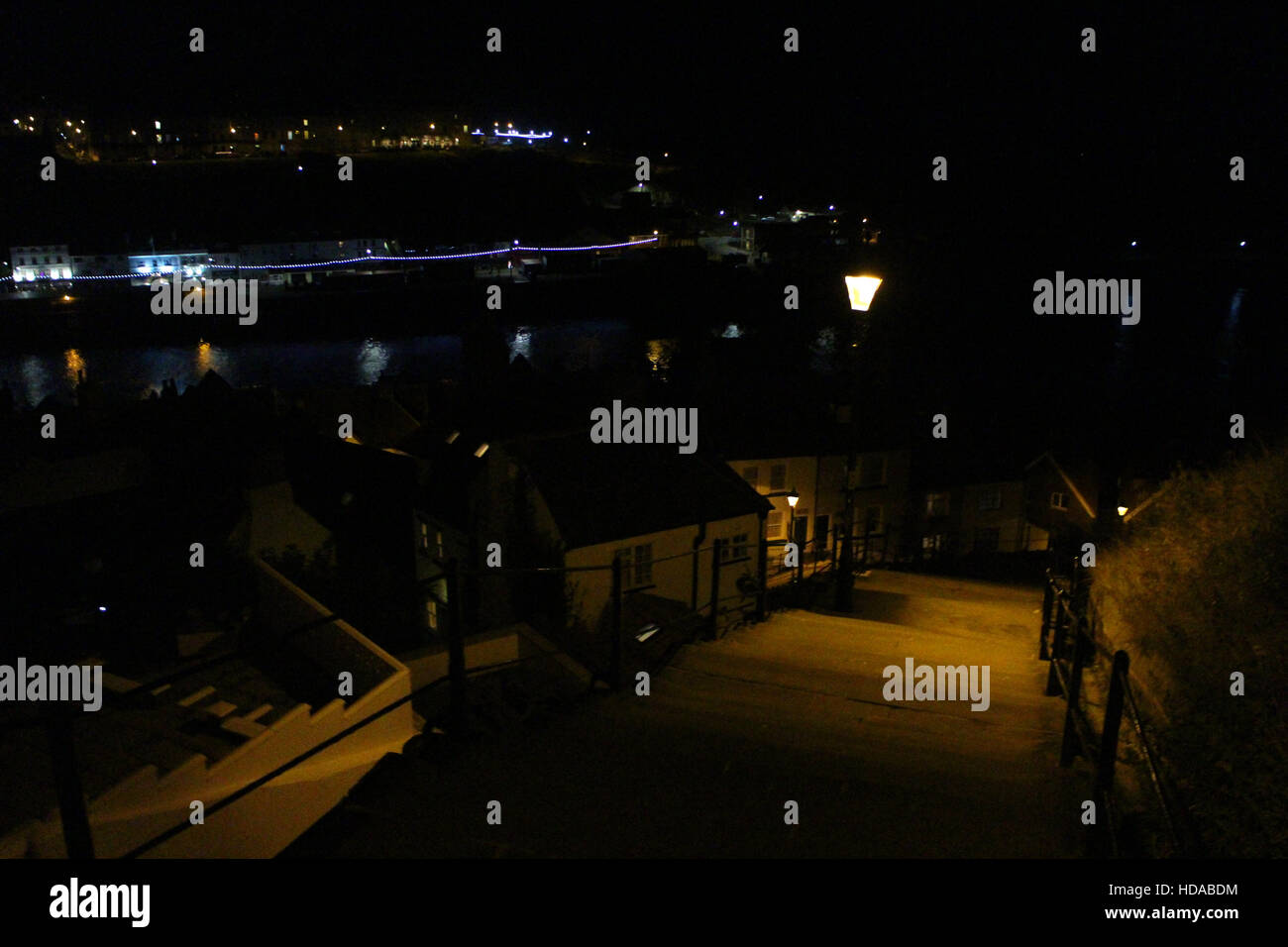 Whitby street lights and the 99 steps lit up at night Stock Photo - Alamy