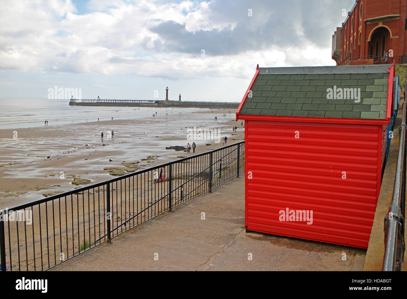 Coloured beach hut on Whitby promenade Stock Photo - Alamy