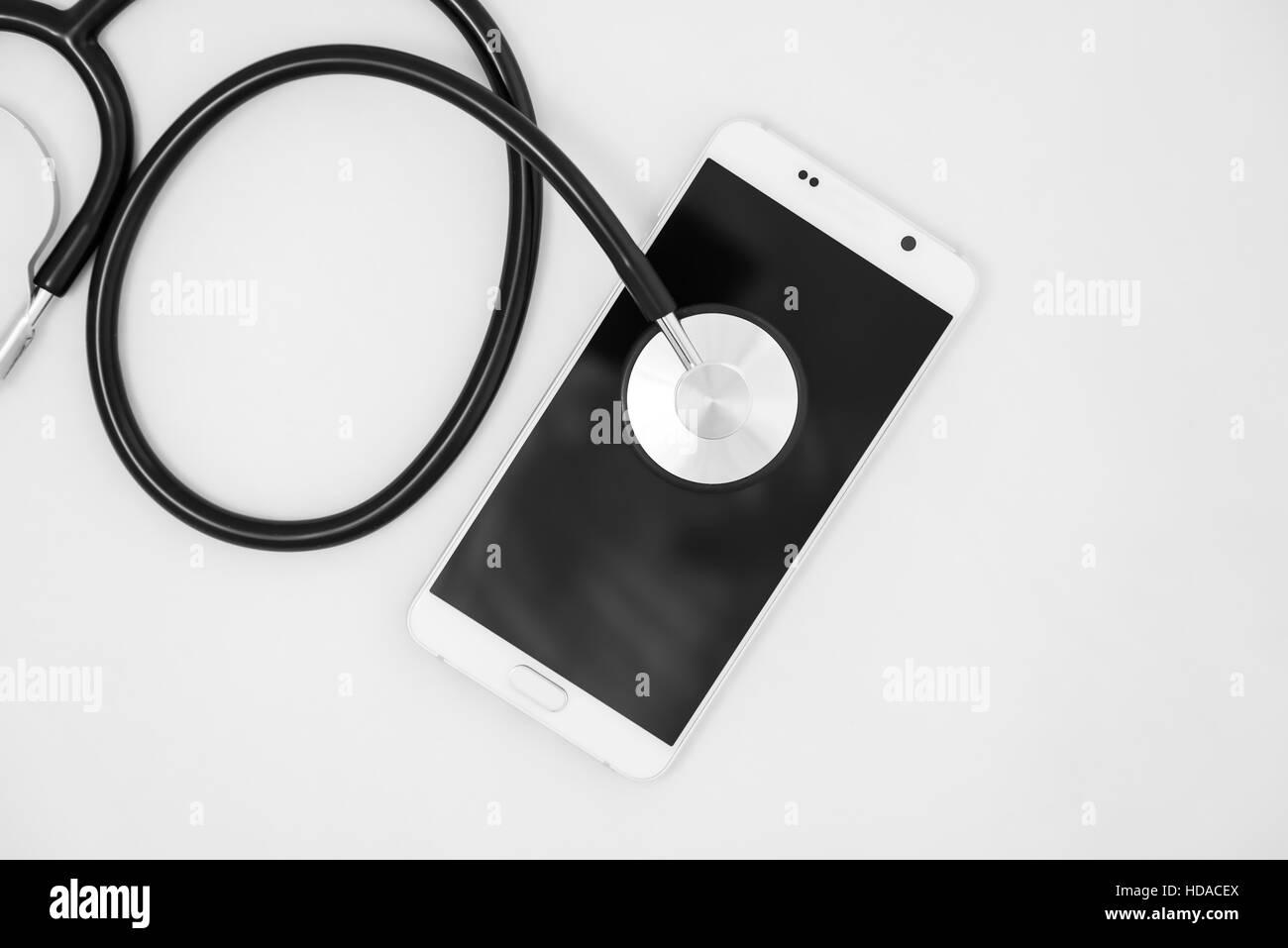 Medical stethoscope tool over the surface of a mobile smart phone ...