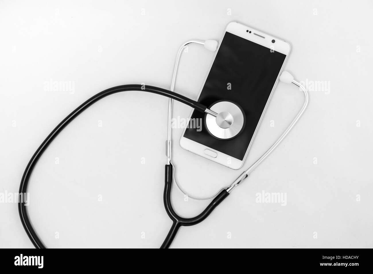Medical stethoscope tool over the surface of a mobile smart phone ...