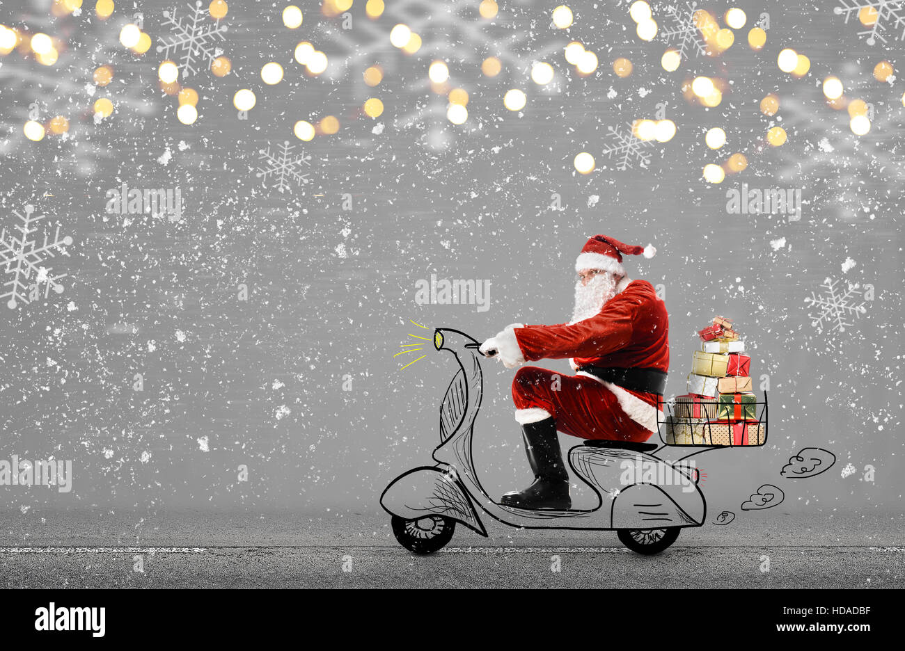 Santa Claus on scooter Stock Photo - Alamy