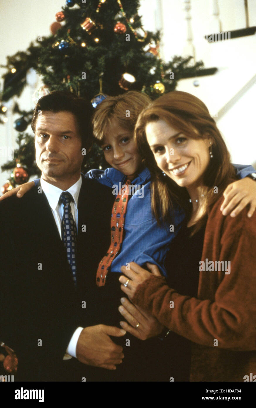 LIKE FATHER LIKE SANTA, (from left): Harry Hamlin, Curtis Blanck, Megan ...