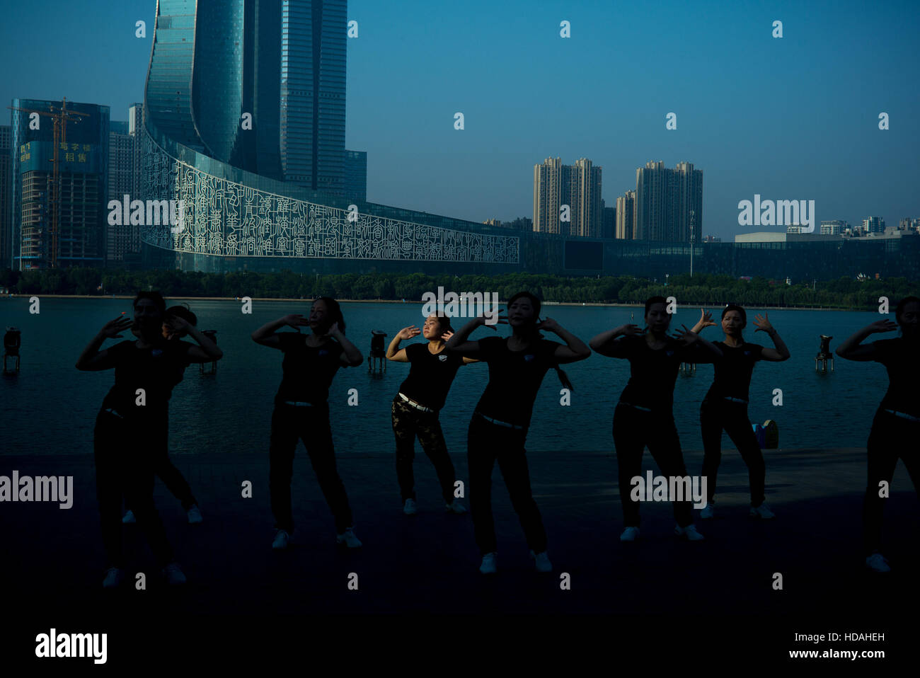 Hefei, China's Anhui Province. 24th July, 2016. Members of a dancing ...