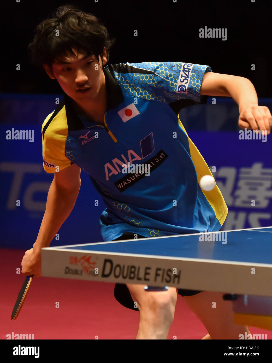 Doha, Qatar. 10th Dec, 2016. Muramatsu Yuto of Japan returns a shot ...