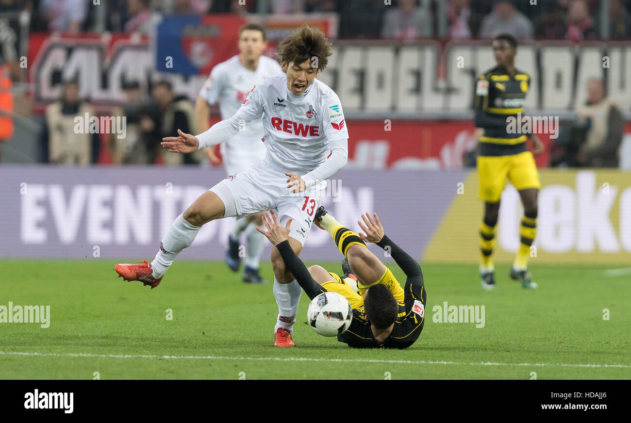 Cologne, Germany. 10th Dec, 2016. Cologne's Yuya Osako (L) and Dortmund ...